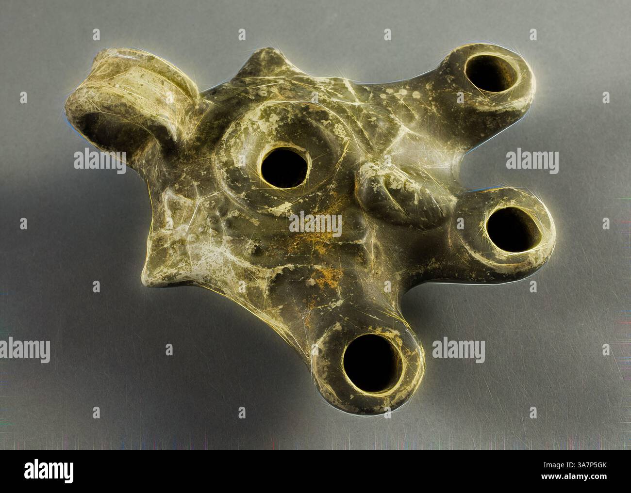 An ancient artifact featuring an intricate design with multiple ...