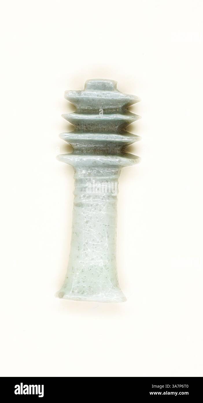 A stylized sculpture resembling a pagoda or tower, crafted from ...