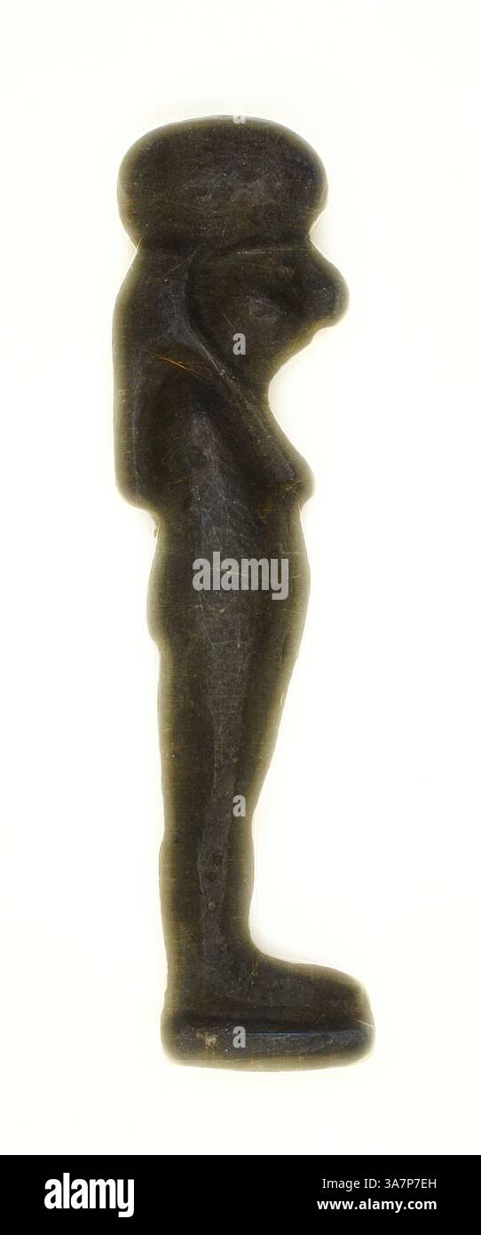 A slender figurine with an elongated form, featuring simplified ...