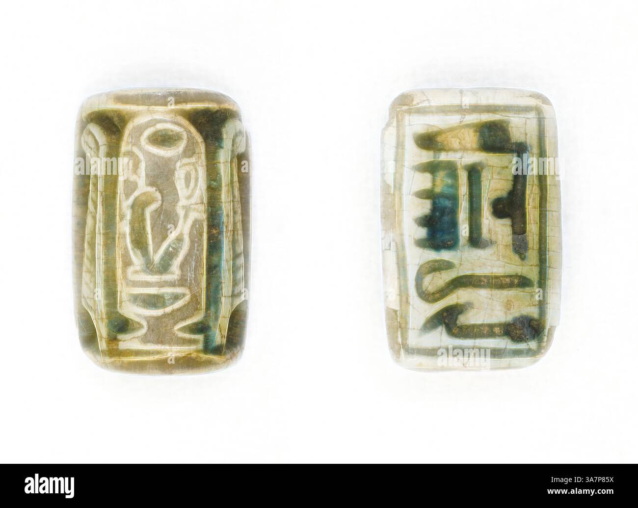 An intricately carved tablet featuring hieroglyphics, with detailed ...