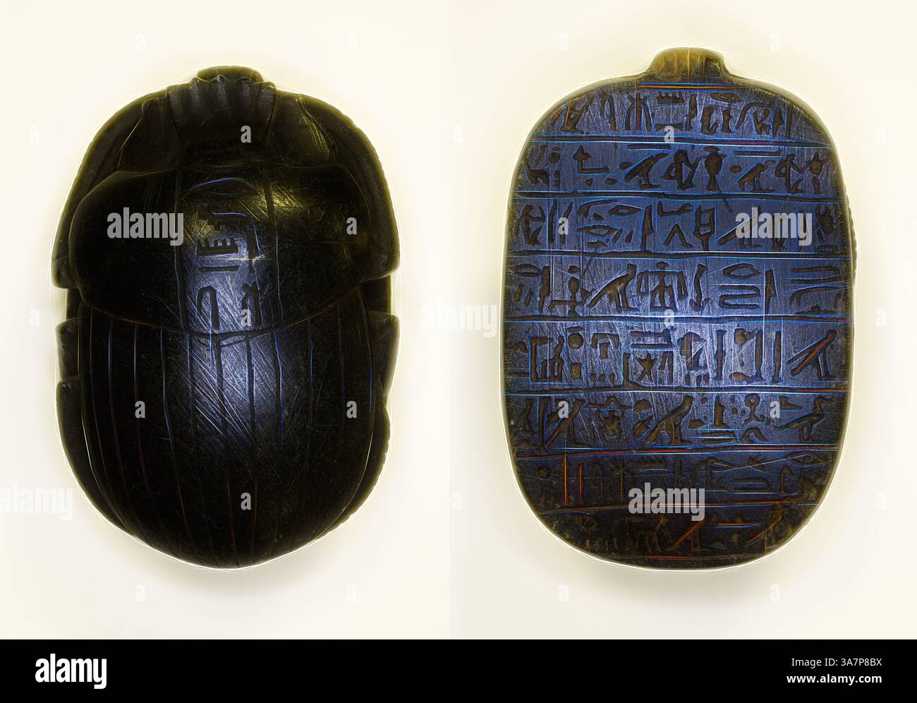 An ancient scarab amulet featuring intricate hieroglyphics on one side ...