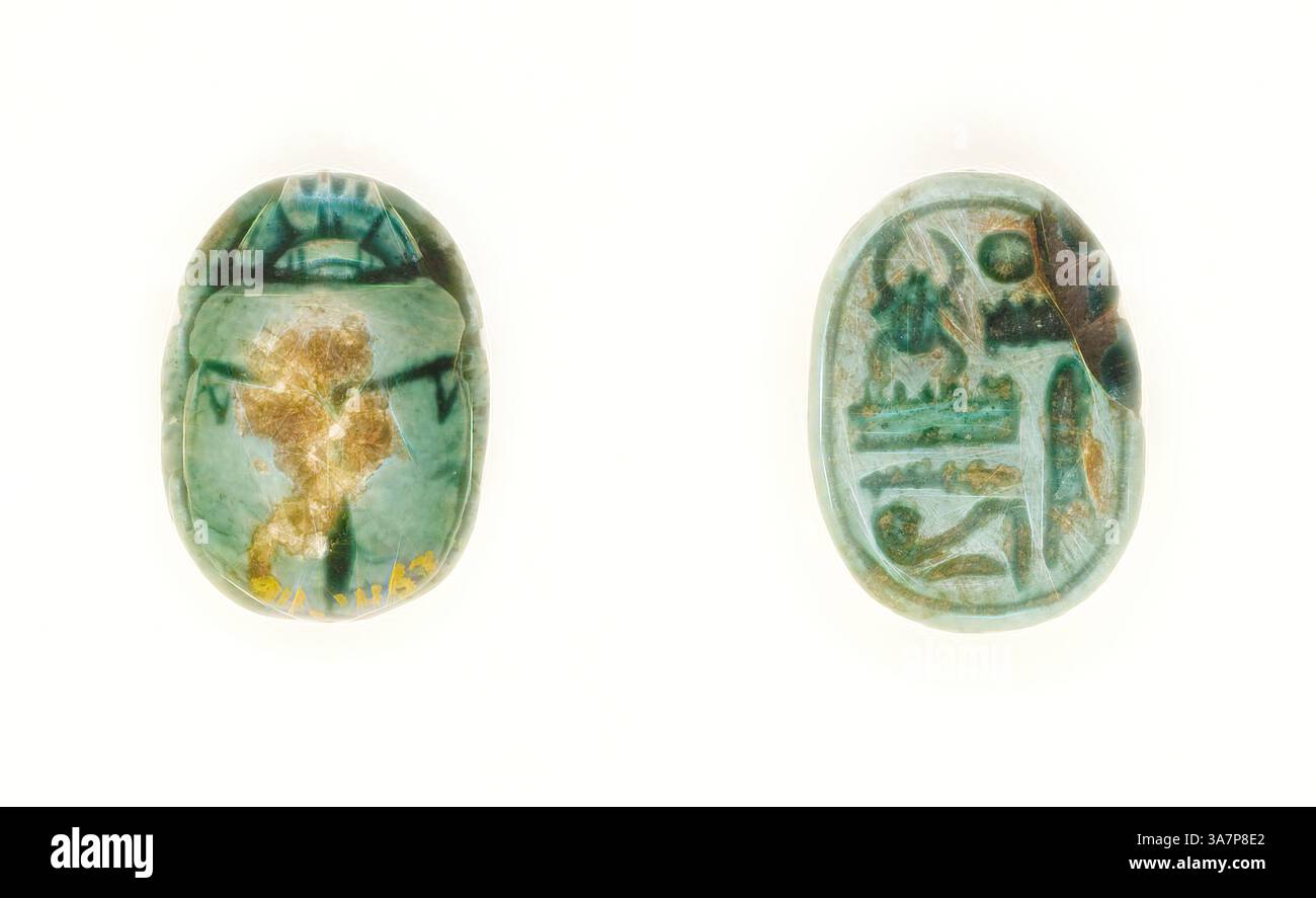 A detailed scarab amulet featuring intricate carvings and vibrant ...