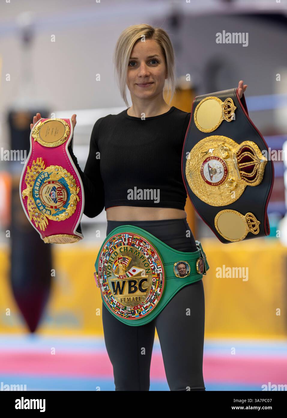 Augsburg, Germany. 27th Mar, 2025. Tina Rupprecht stands with her title ...