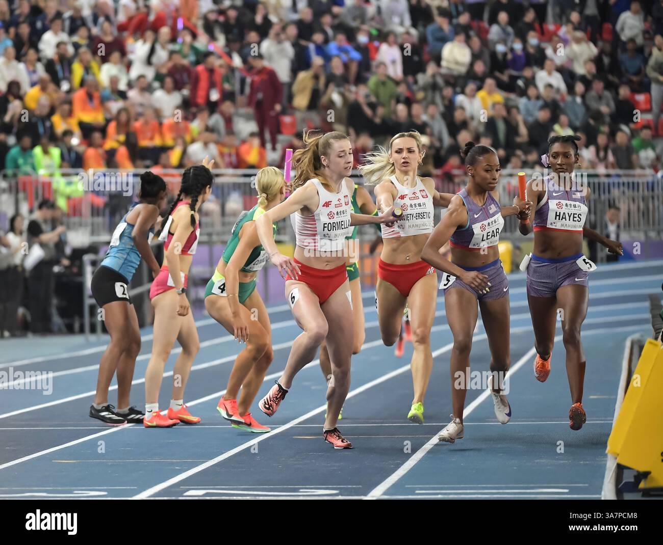 Women’s 4x400m relay change over at the World Athletics Indoor ...