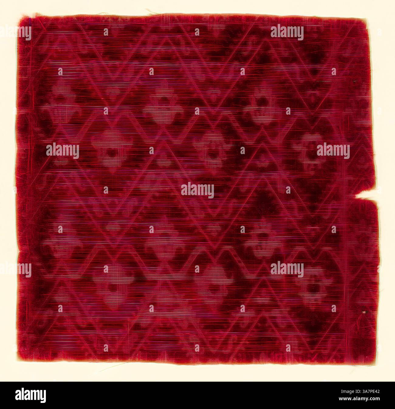 A richly textured textile showcasing intricate geometric patterns in ...