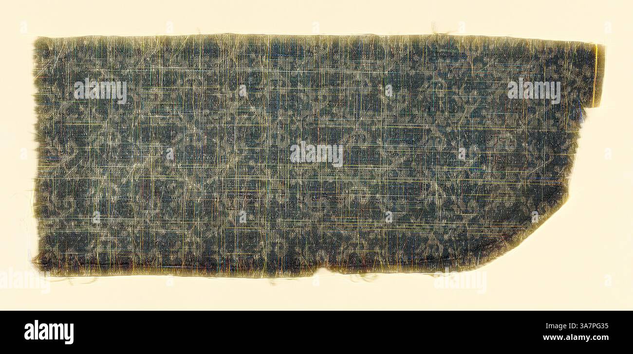 A textured fabric fragment featuring intricate woven patterns in shades ...