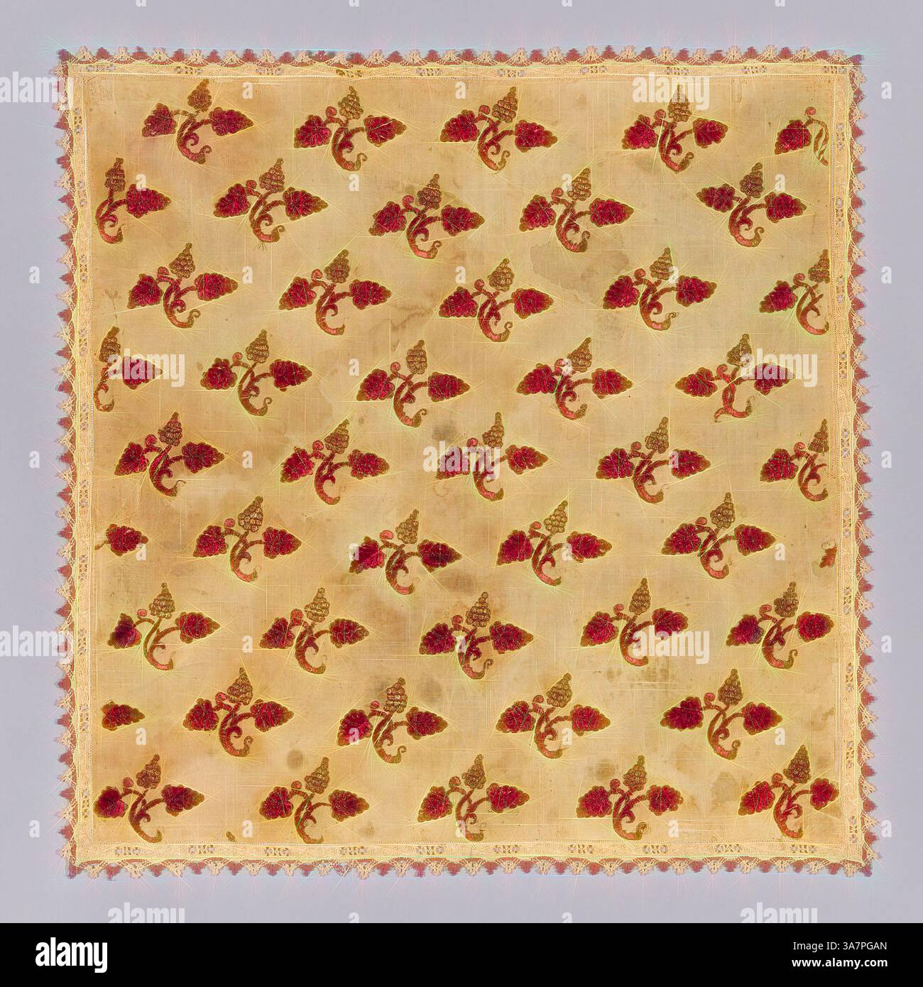 A decorative fabric featuring a repeating pattern of stylized floral ...