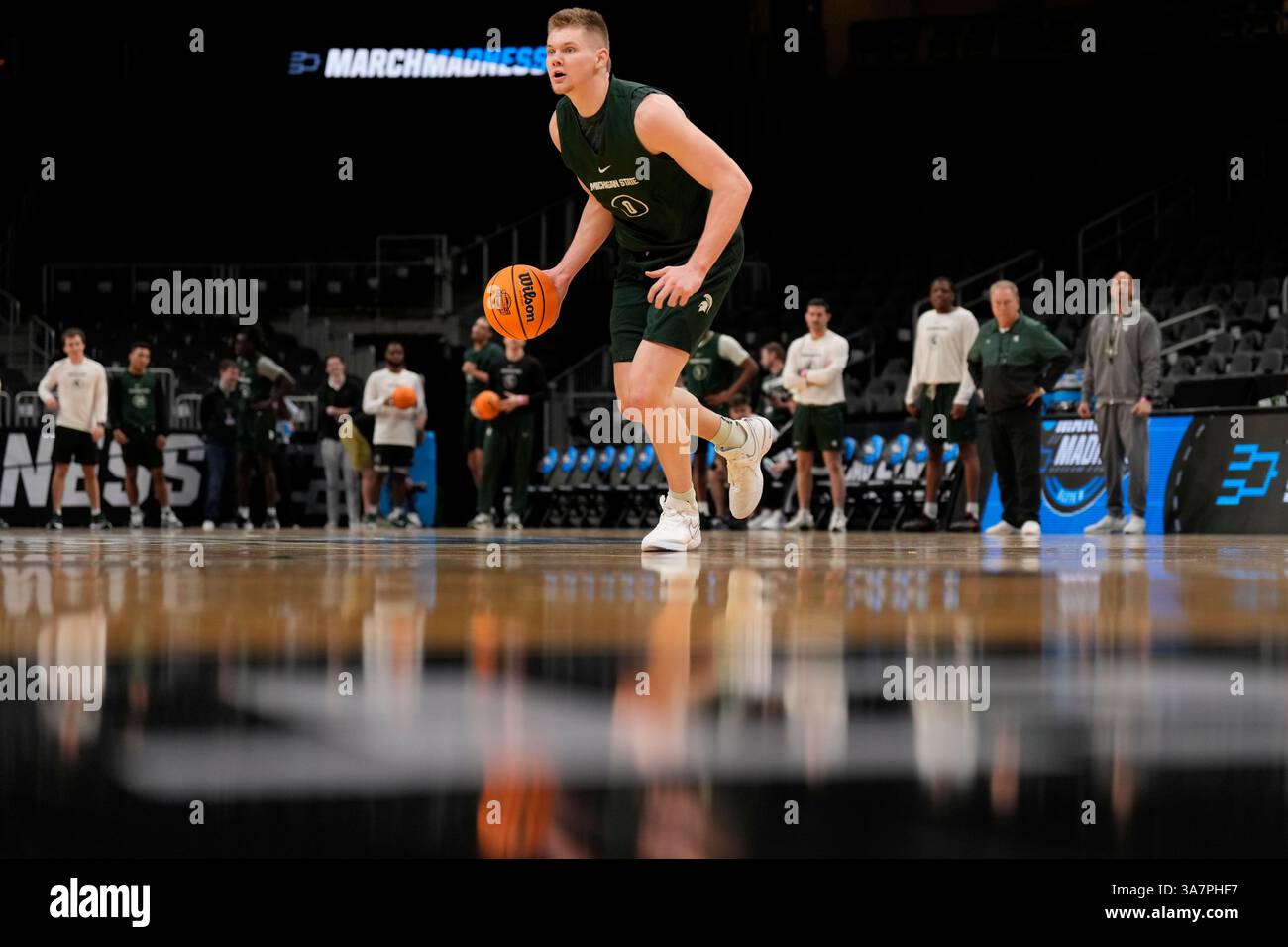 Michigan State forward Jaxon Kohler (0) runs a drill during practice ...