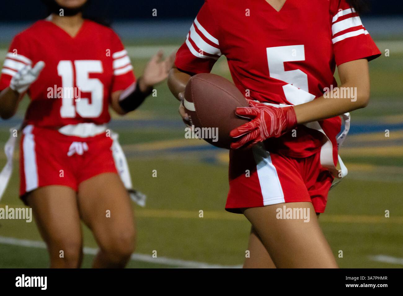 Women's Flag Football in Red and White uniform and one woman with red ...