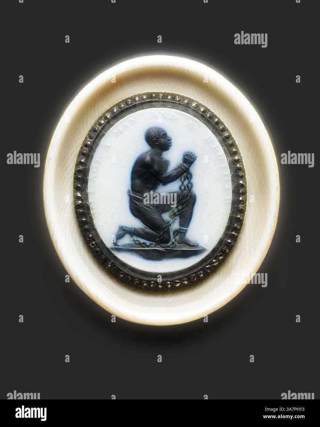 A circular medallion featuring a kneeling figure, depicted in a ...