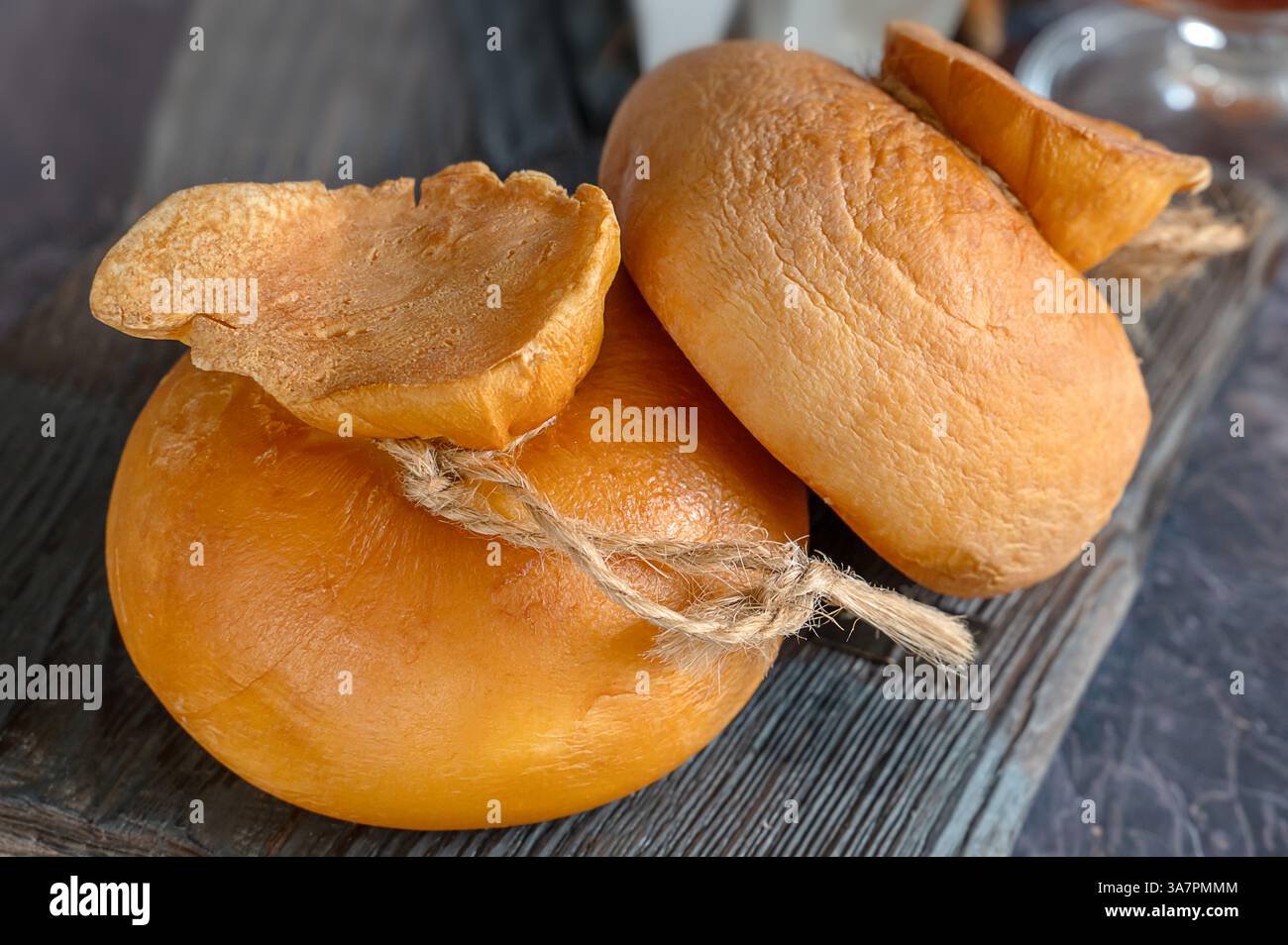 Collection of cheeses, rennet cheese smoked suluguni made from cow's ...