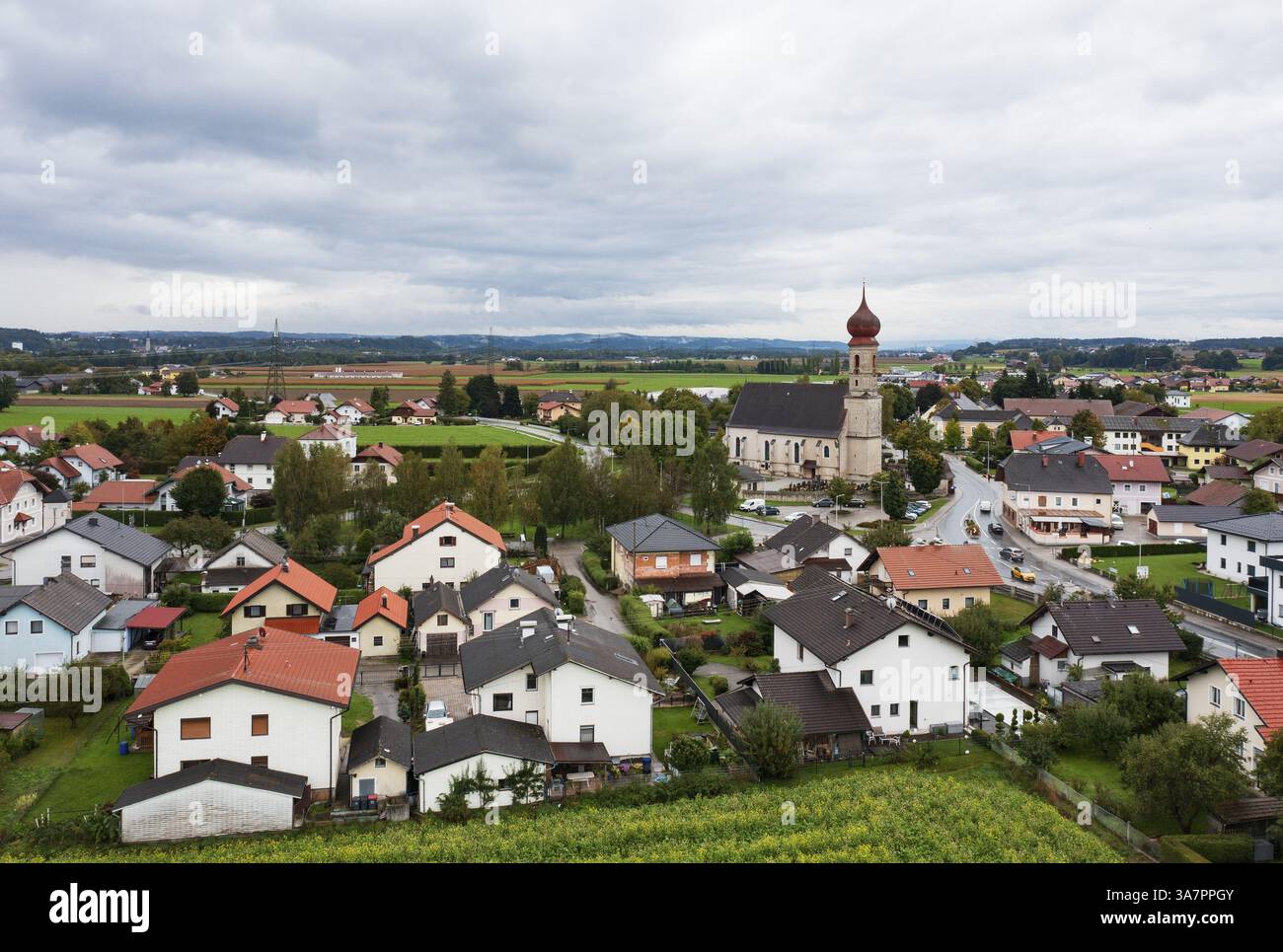 Drone shot, view of village with church, Burgkirchen, Innviertel, Upper ...