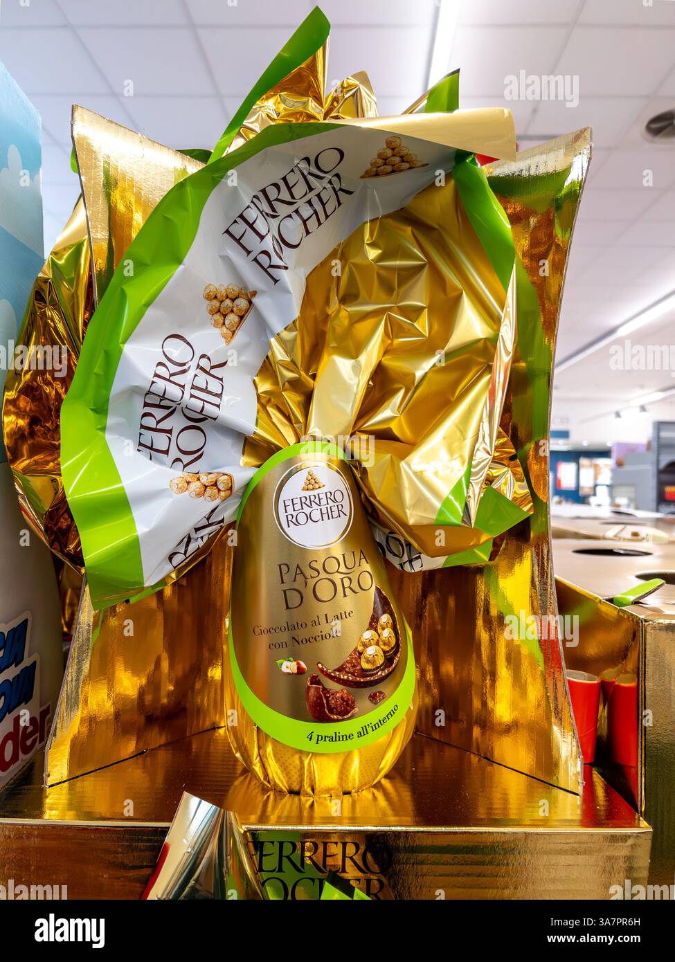 Italy - March 25, 2025: Ferrero Rocher Easter chocolate eggs with ...