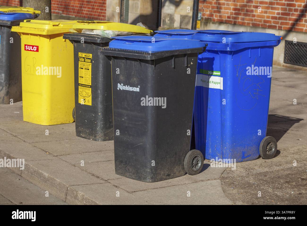 Colourful different waste bins for waste separation, Bremen, Germany ...