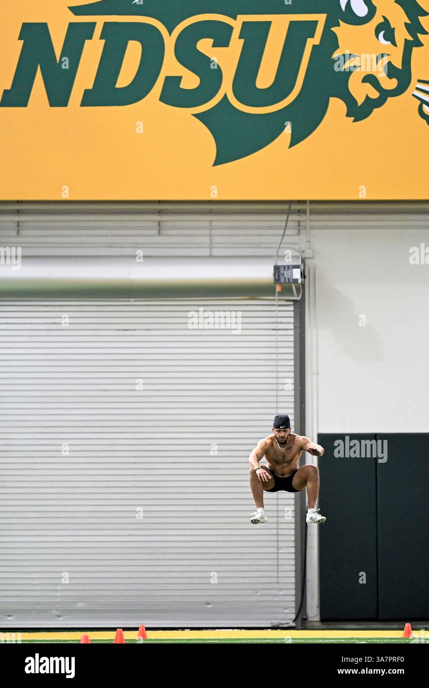 North Dakota State wide receiver Braylon Henderson warms up before ...