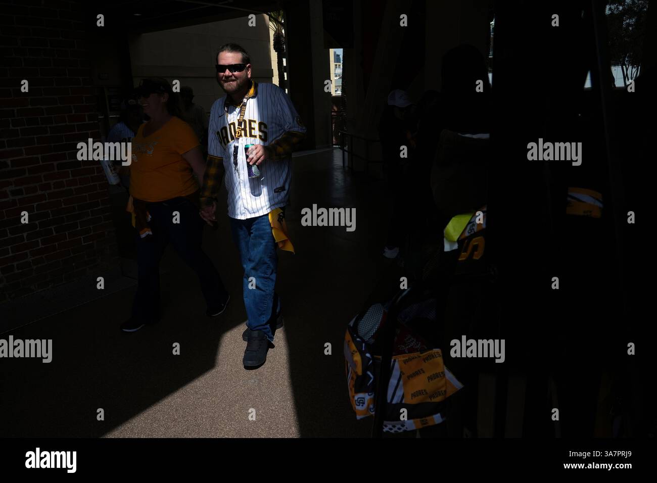 Fans arrive to Petco Park before an opening-day baseball game between ...