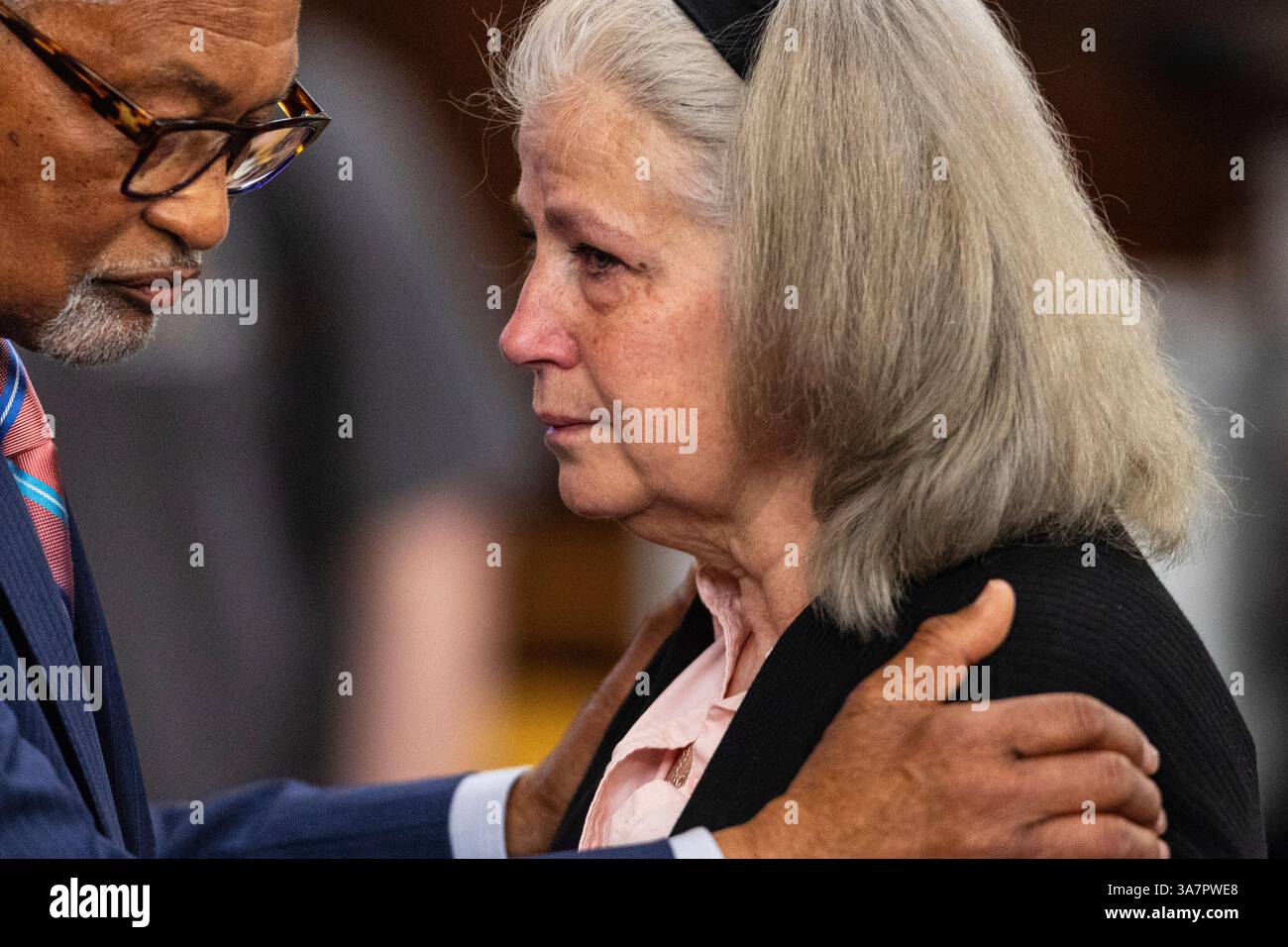 Linda Stermer talks with her defense attorney Skip Kelly after opening ...