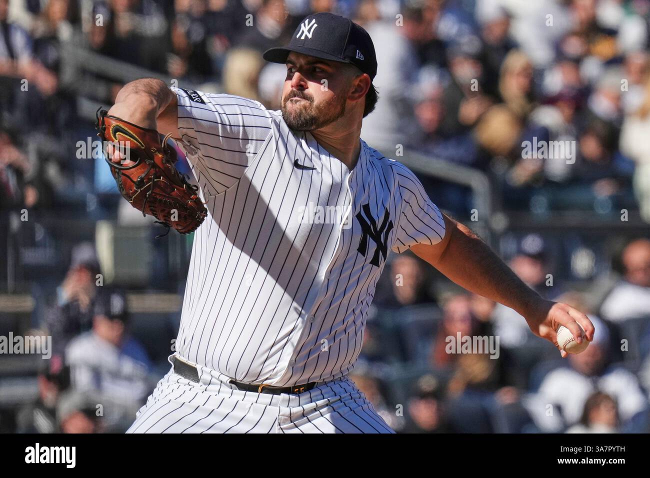 New York Yankees pitcher Carlos Rodón throws during the first inning of an opening-day baseball ...