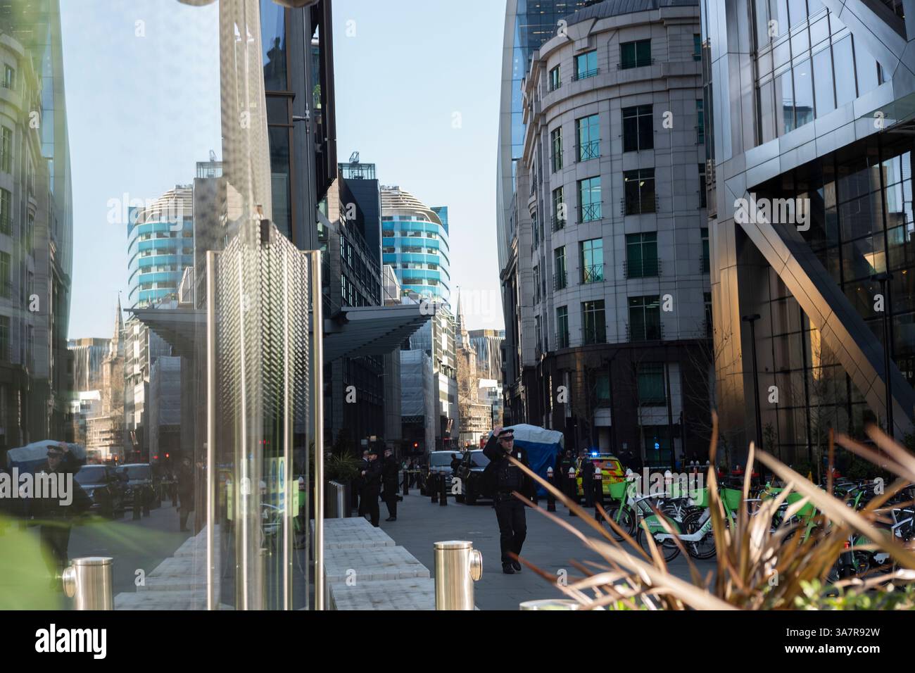 City workers gather on Bishopsgate after a person has died after falling from a height near ...