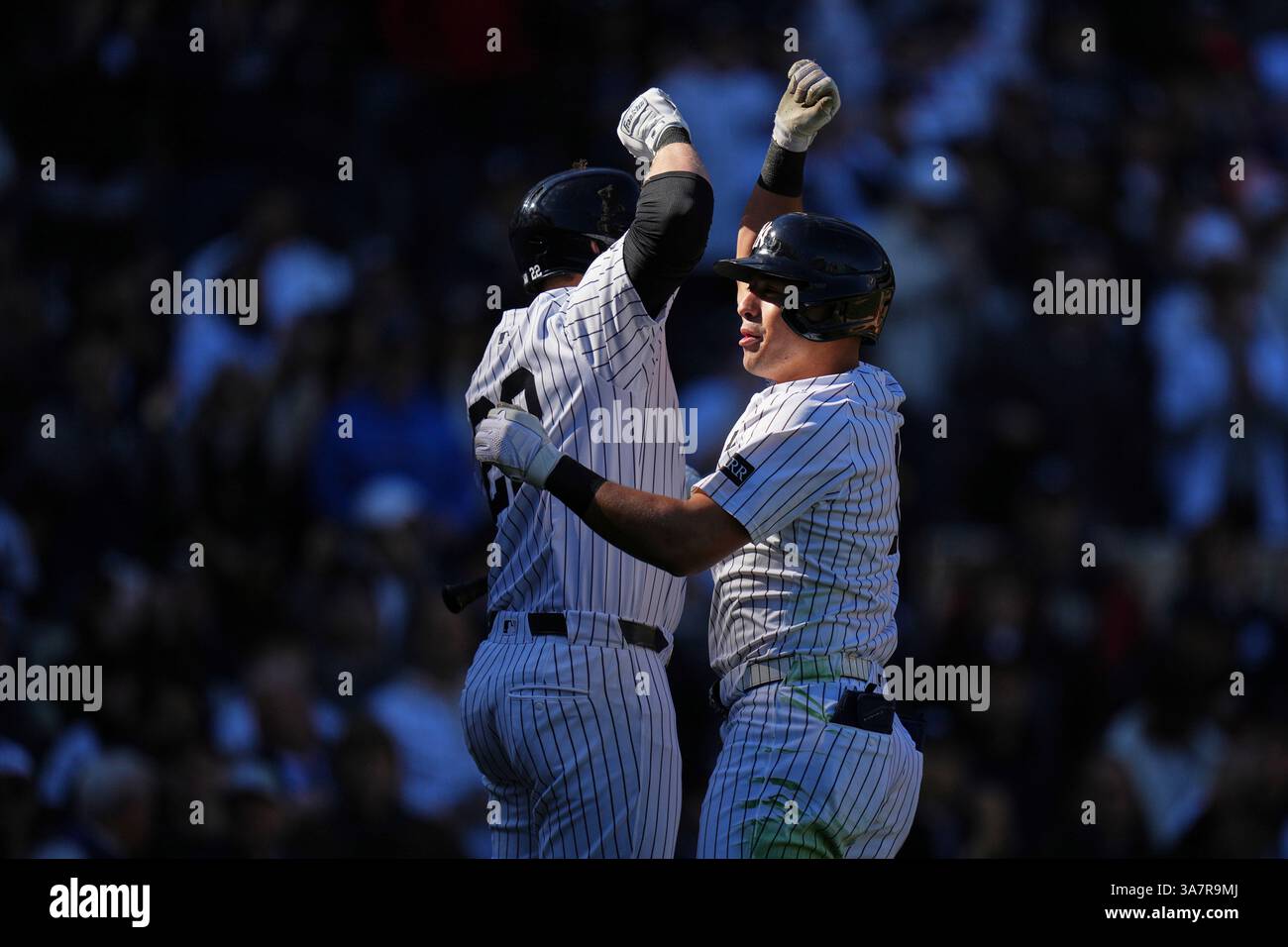 New York Yankees' Anthony Volpe, right, celebrates his solo home run ...