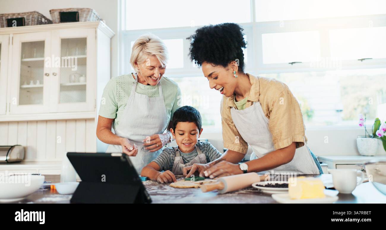 Tablet, family and mother baking with child in kitchen for online ...