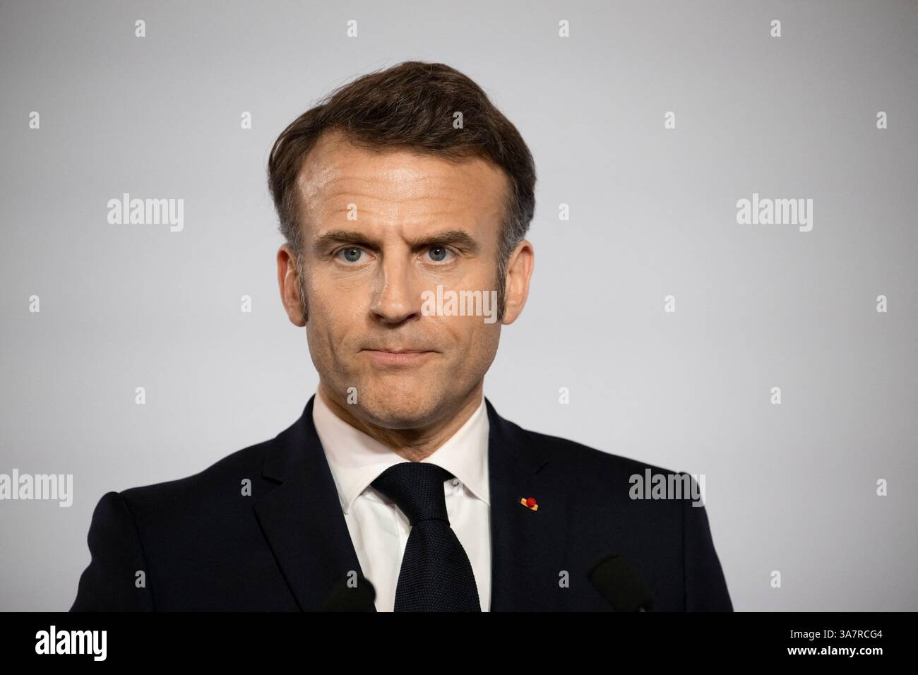 French President Emmanuel Macron gestures and looks during the ...