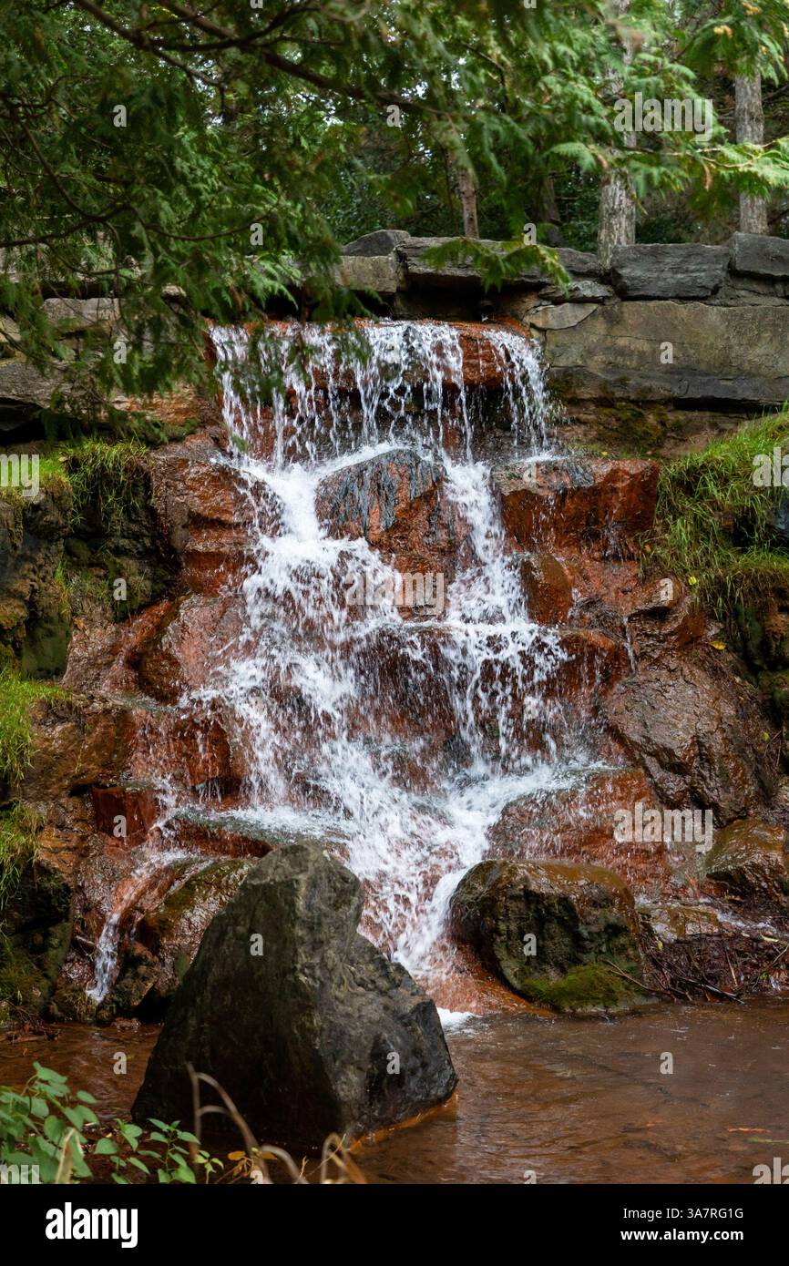 Waterfall in the park in summer. Keeley Falls in Andrew Haydon Park in Ottawa, Canada Stock ...
