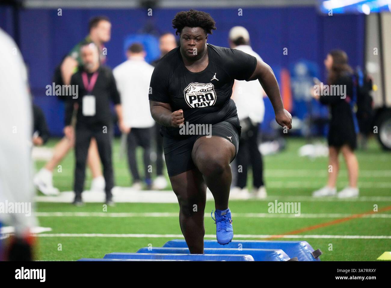 Florida defensive lineman Desmond Watson runs through a drill during ...