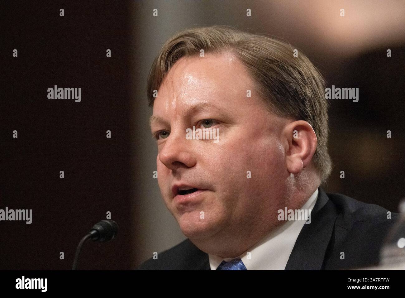 Michael Duffy makes opening remarks at a Senate Committee on Armed ...