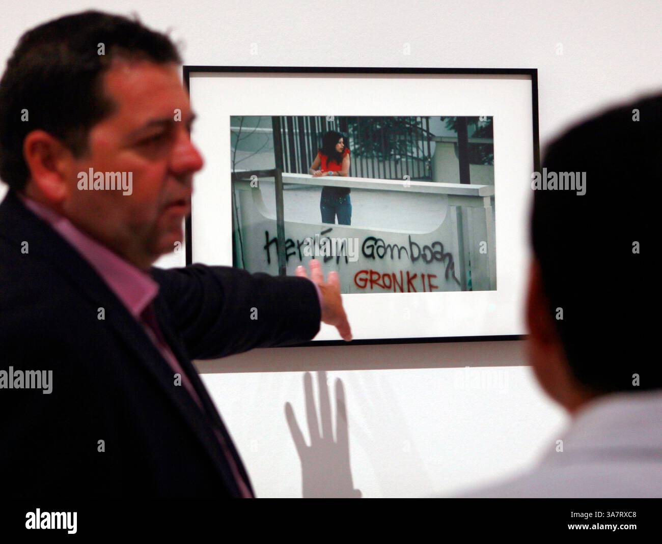 FILE - A photo by Harry Gamboa, "Spray Paint LACMA 1972," is displayed ...
