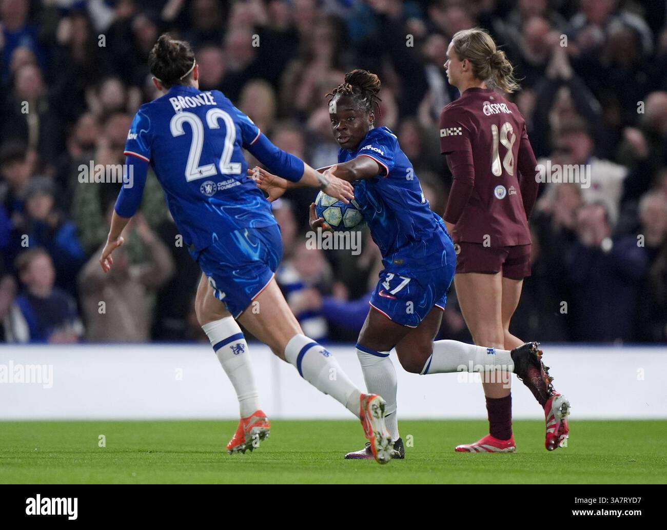 Chelsea's Sandy Baltimore (centre) celebrates with team-mate Lucy ...
