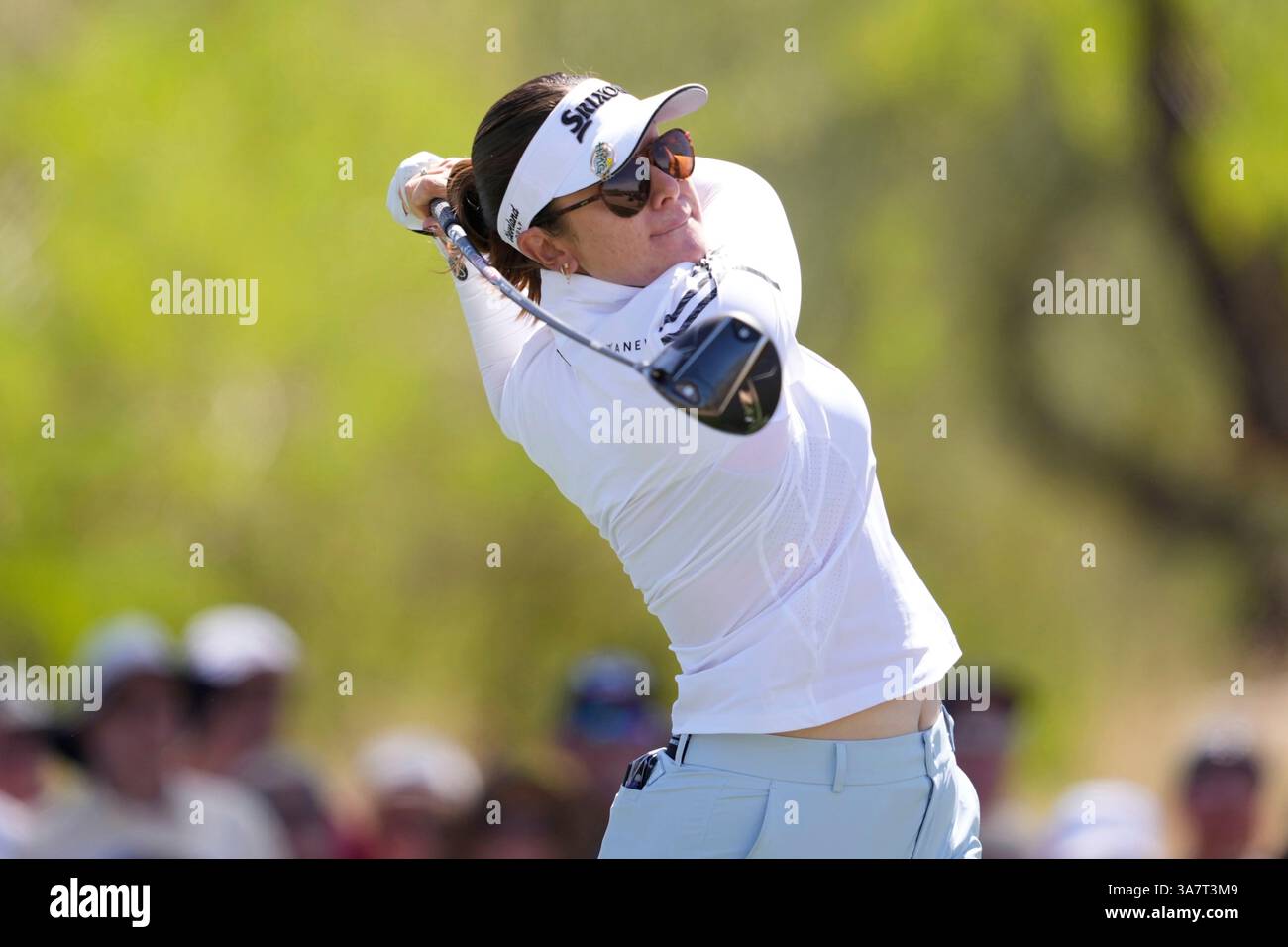 Hannah Green, of Australia, hits from the first tee during the first ...