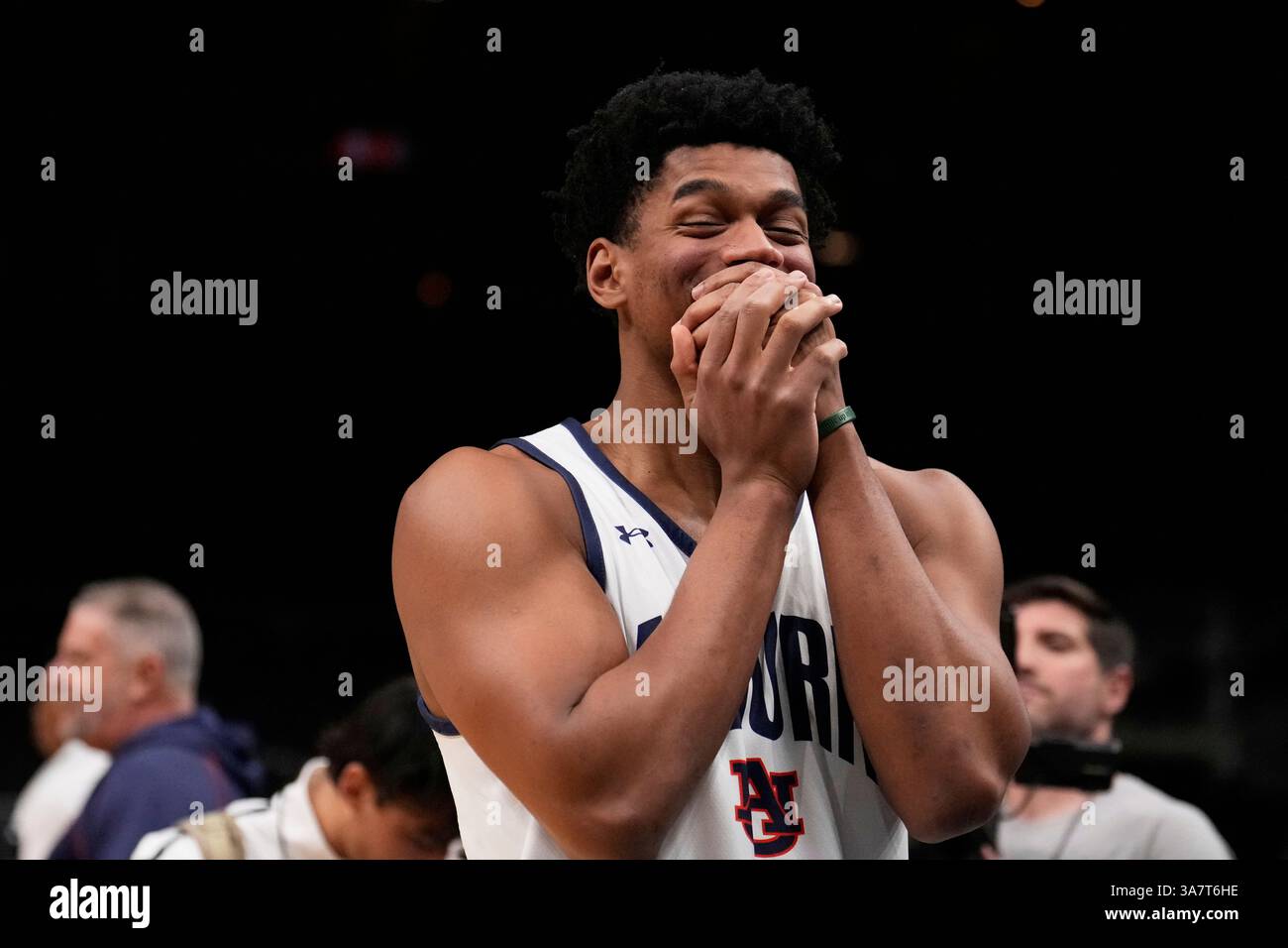 Auburn center Dylan Cardwell (44) laughs during practice, Thursday ...