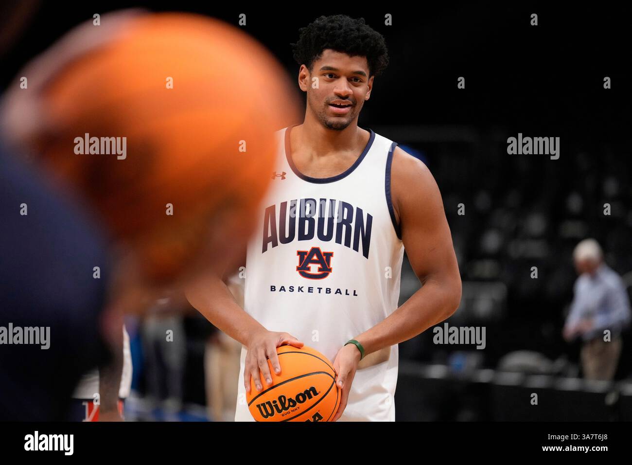 Auburn center Dylan Cardwell (44) runs drills during practice, Thursday ...