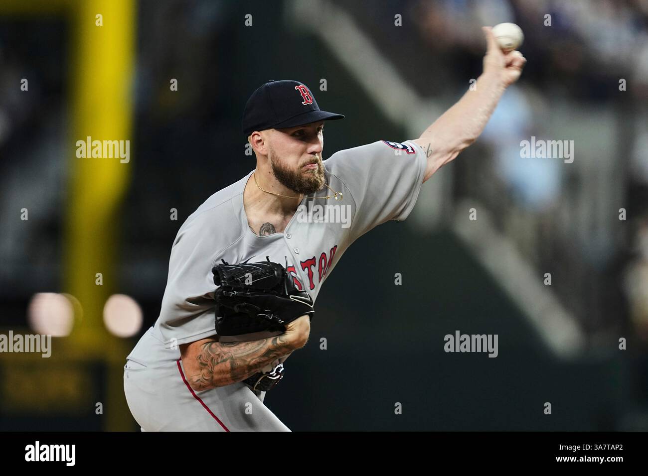 Boston Red Sox pitcher Garrett Crochet throws to the Texas Rangers in ...