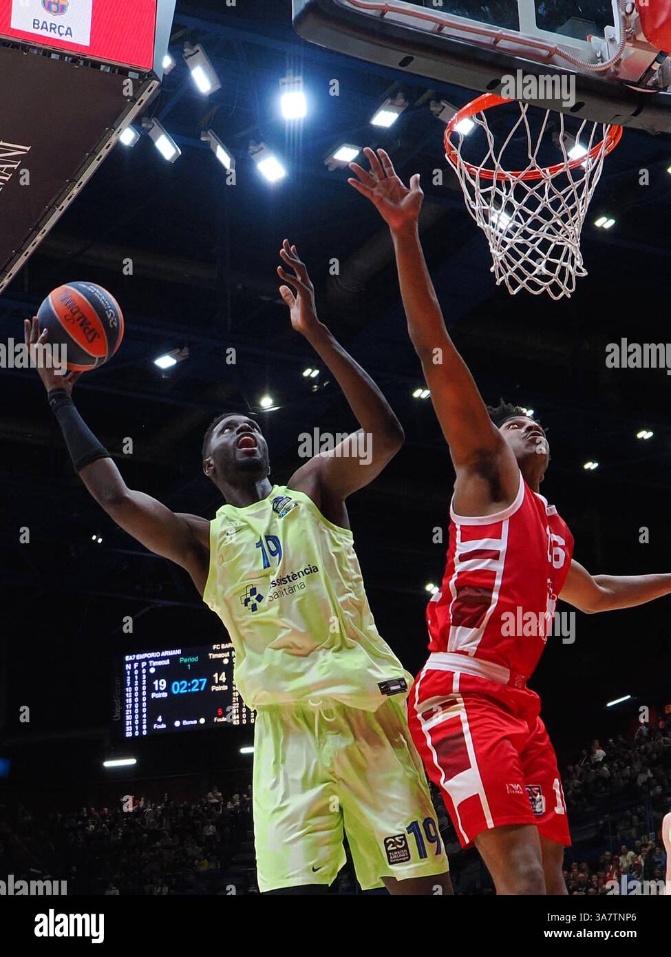 Milan, Italy. 27th Mar, 2025. Youssoupha Fall (FC Barcelona) & Zack ...