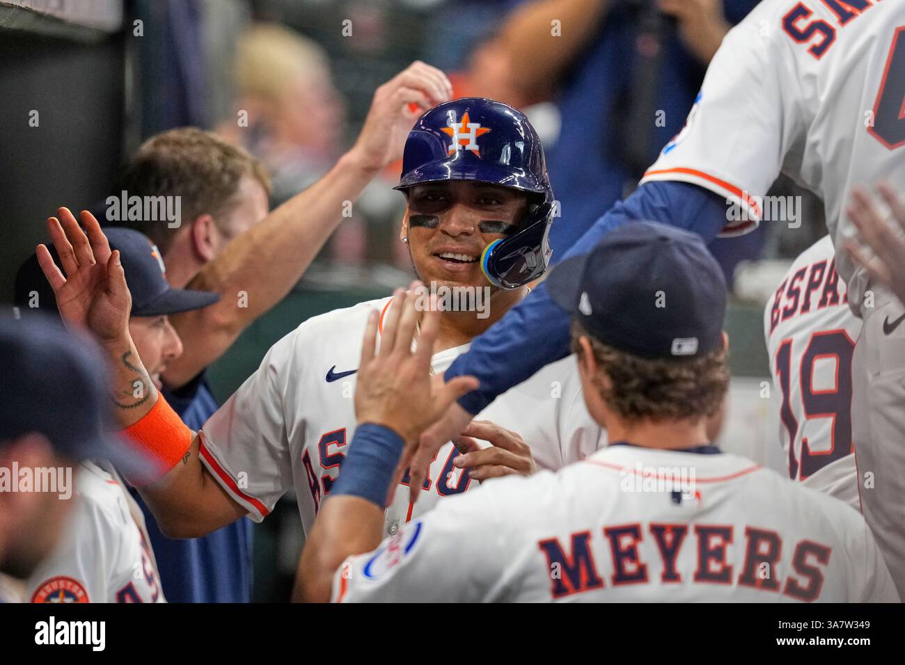 Houston Astros' Isaac Paredes celebrates in the dugout after scoring ...