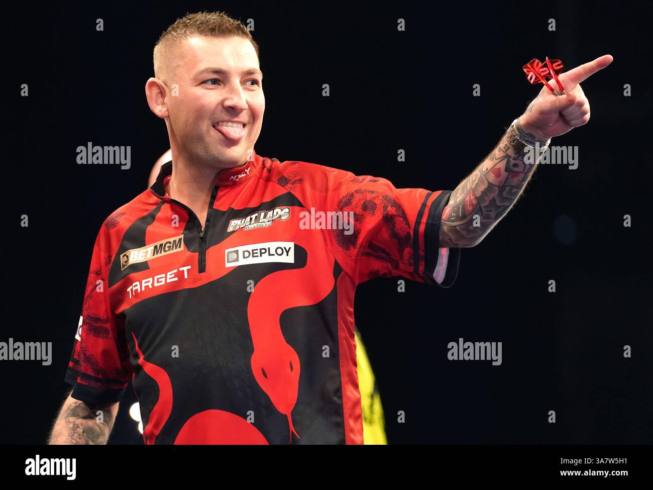 Nathan Aspinall celebrates victory against Michael van Gerwen (not ...