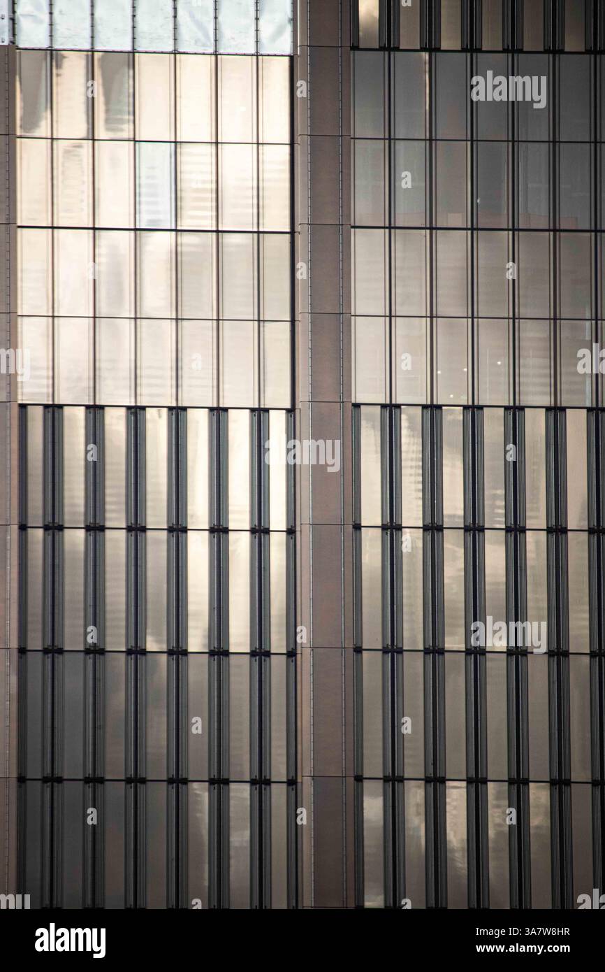 Beautiful view of a reflective, modern, polished steel paneled building ...