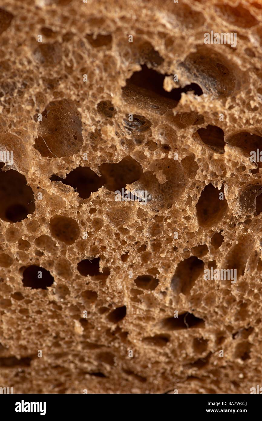 A detailed close-up of ciabatta bread highlights its unique texture and ...