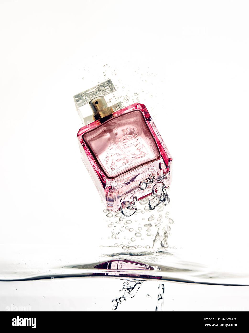 Creative design of flacon with aromatic perfume between splattering ...