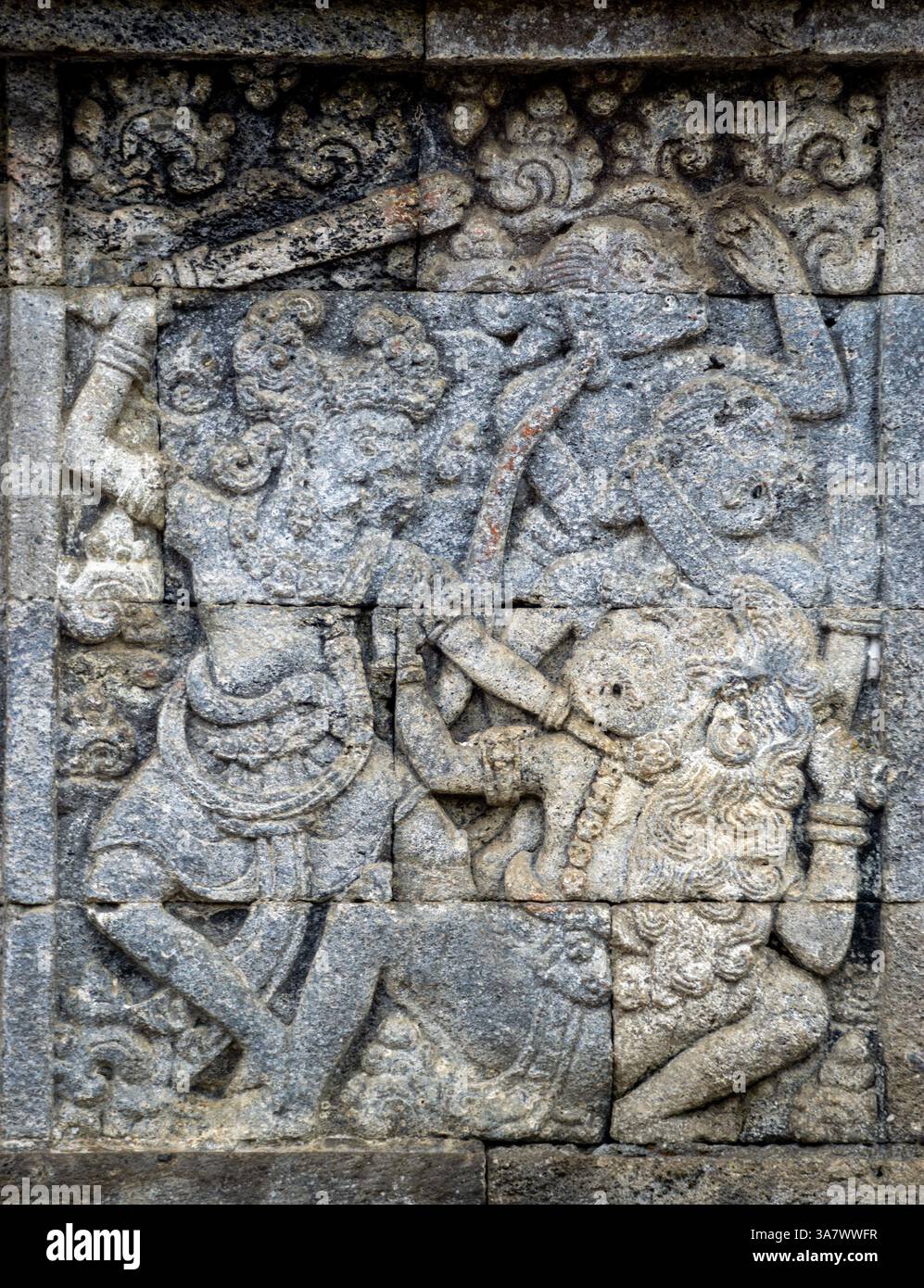 The beautiful relief carvings on the walls of Penataran temple Stock ...
