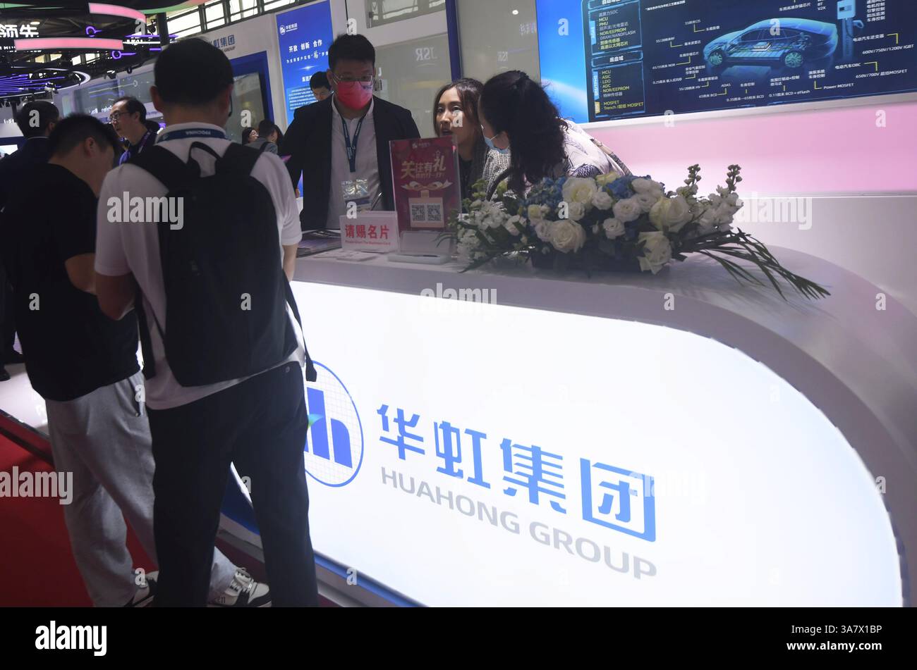 SHANGHAI, CHINA - MARCH 26, 2025 - Visitors visit the stand of Huahong ...