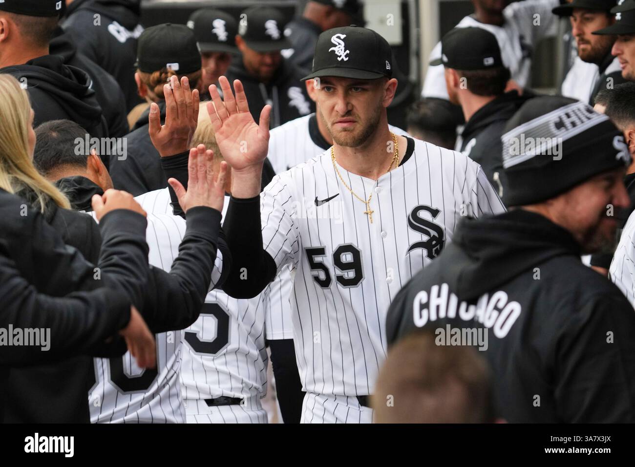 Chicago White Sox starting pitcher Sean Burke celebrates with teammates ...
