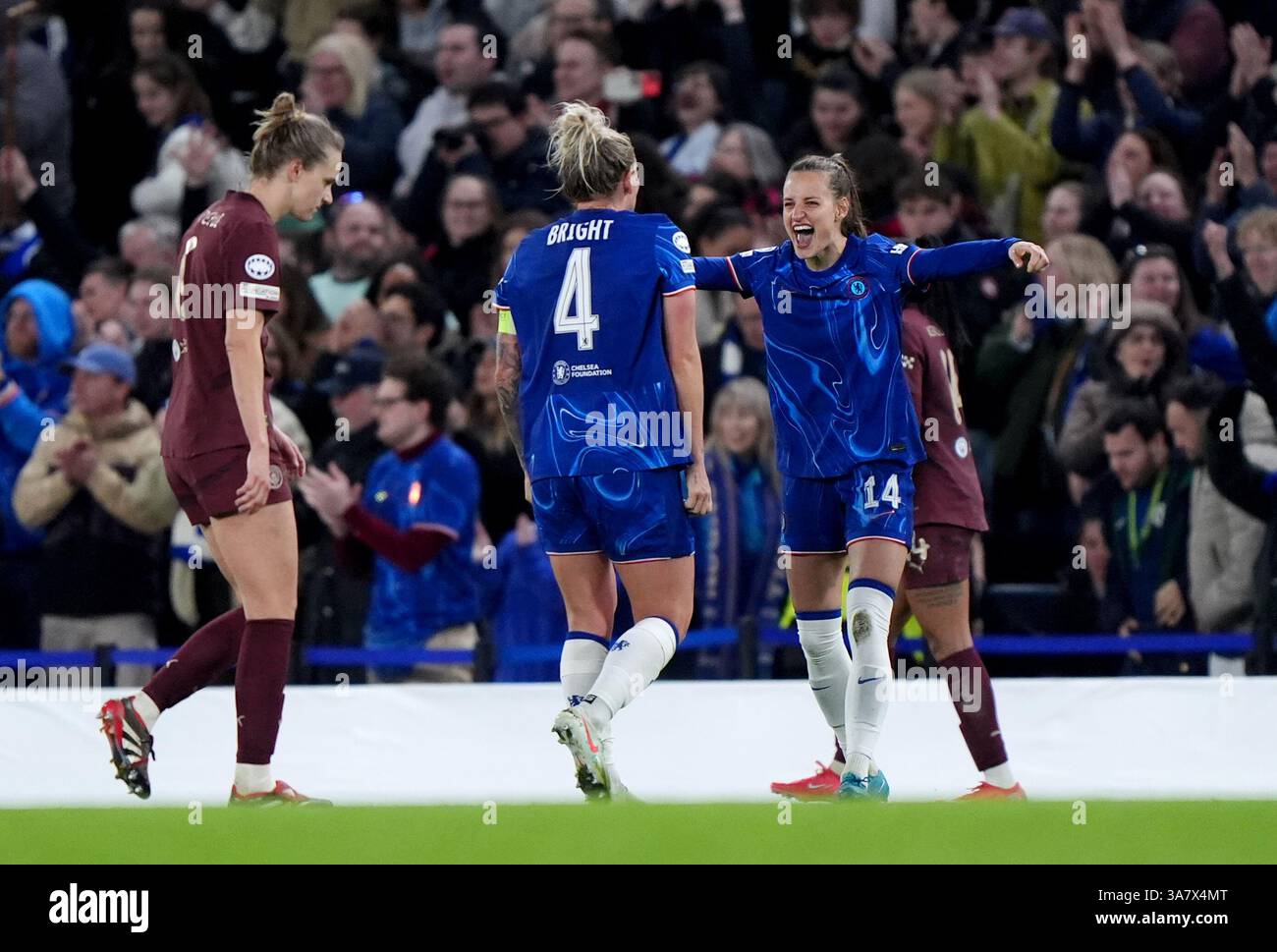 Chelsea's Nathalie Bjorn (right) and Millie Bright celebrate the win ...