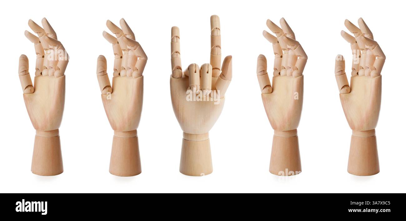 Difference, uniqueness, individuality. Wooden human hand models and one ...