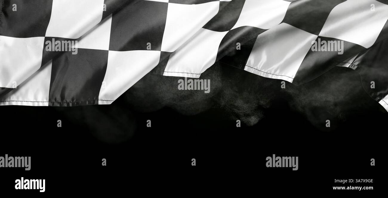 Racing flag with black and white checkers in darkness with smoke ...