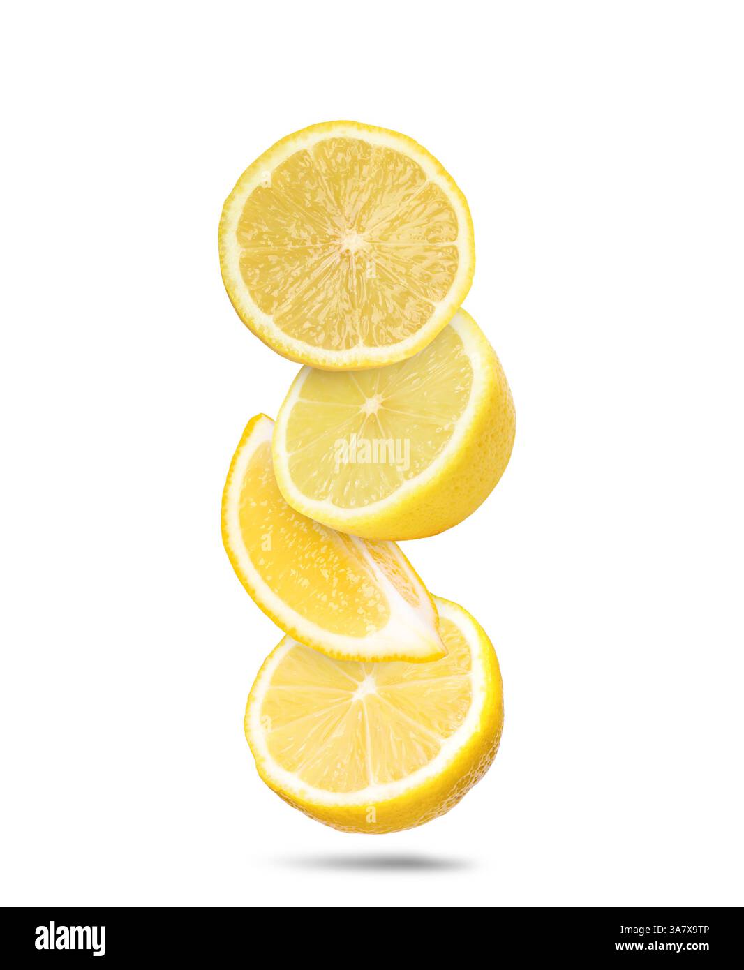 Cut fresh lemons falling on white background Stock Photo - Alamy