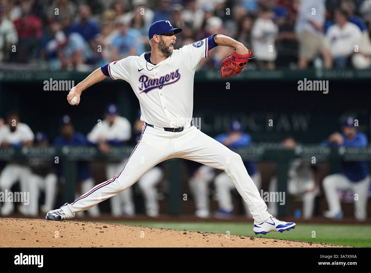 Texas Rangers pitcher Chris Martin throws to the Boston Red Sox in the ...