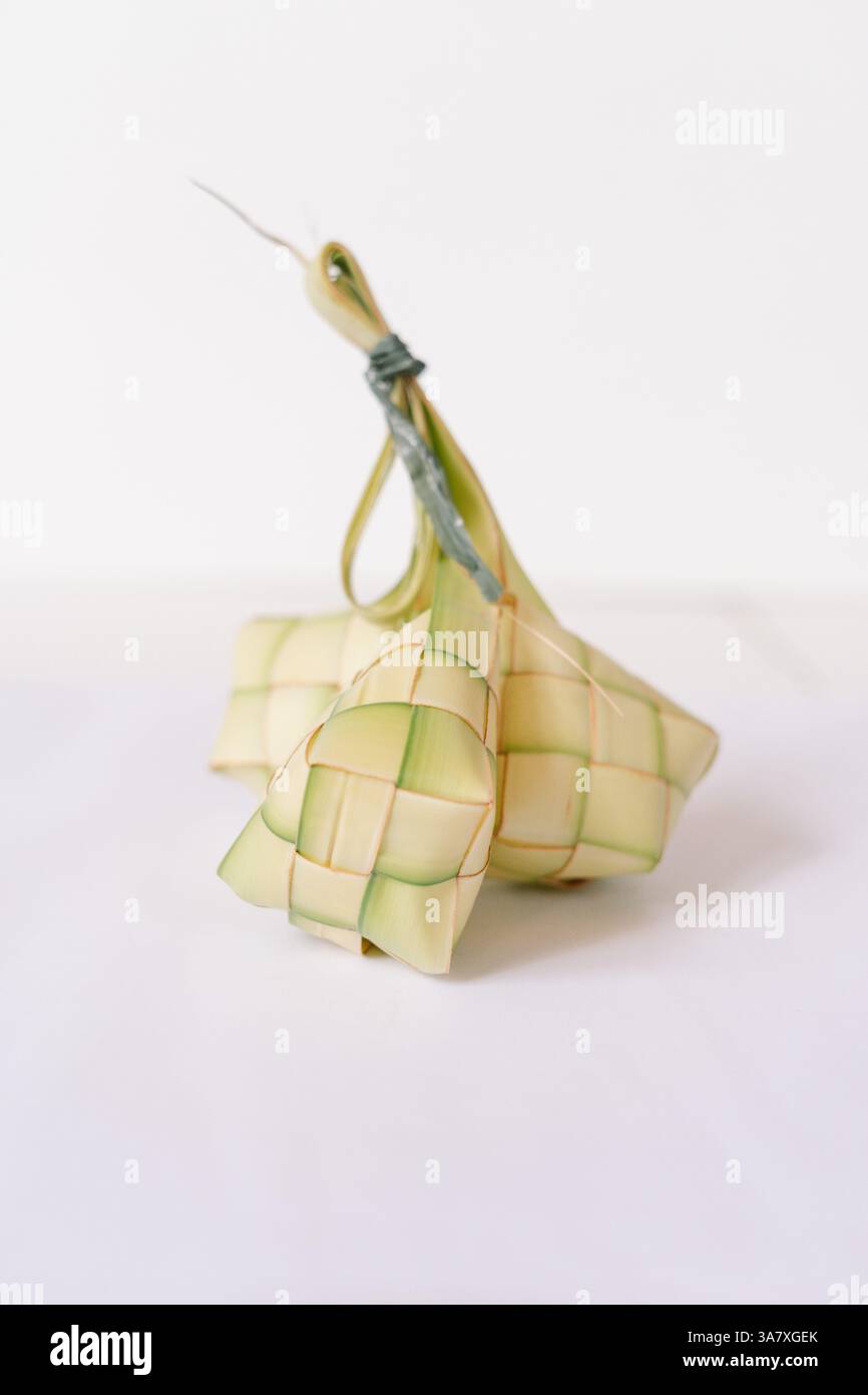 Ketupat, traditional rice dumpling served during Eid al-Fitr. Cooked ...